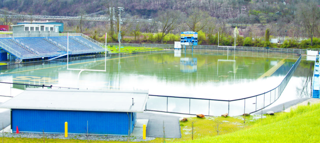 Patterson Field floods, but officials report no damage to turf | News ...